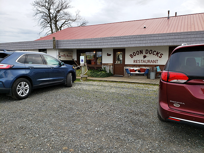 The gravel parking lot – unassuming gateway to some of Delaware's finest seafood. No valet needed when adventure awaits.