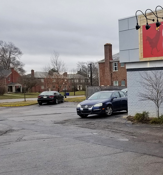 Nestled in a residential neighborhood, The Crispy Coop's modest parking area fills quickly when word gets out about their honey bun cake.