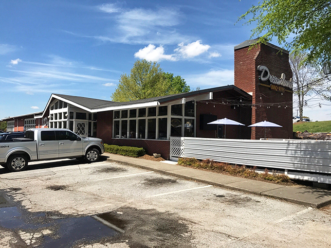 A parking lot that's seen more barbecue anticipation than a therapist's office has seen anxiety – the gateway to smoky paradise.
