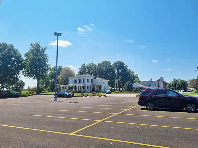 Beyond the parking lot stands the white farmhouse that completes this slice of Americana. Your car will thank you for the break on your Ohio road trip.