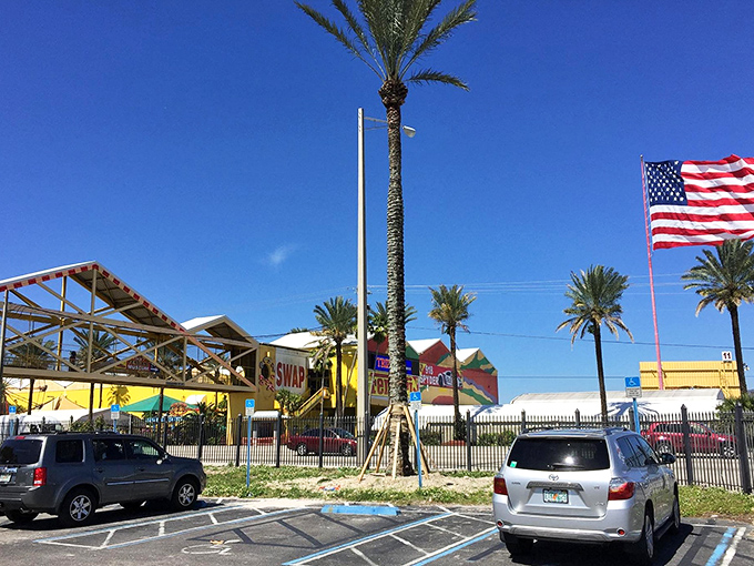 The parking lot fills early with eager shoppers who know the early bird gets the vintage vinyl.