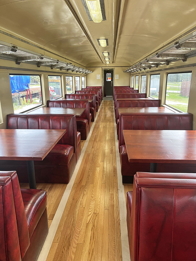Step inside this meticulously restored dining car and you're transported to an era when travel meant polished wood, leather upholstery, and civilized meals on the move.