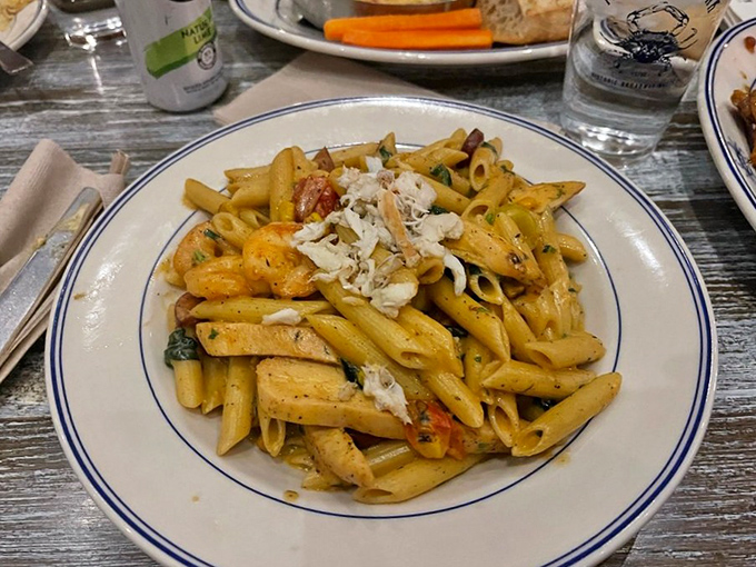 Pasta that doesn't just carry seafood&mdash;it celebrates it! Those tender morsels of crab aren't just toppings; they're the guest of honor.