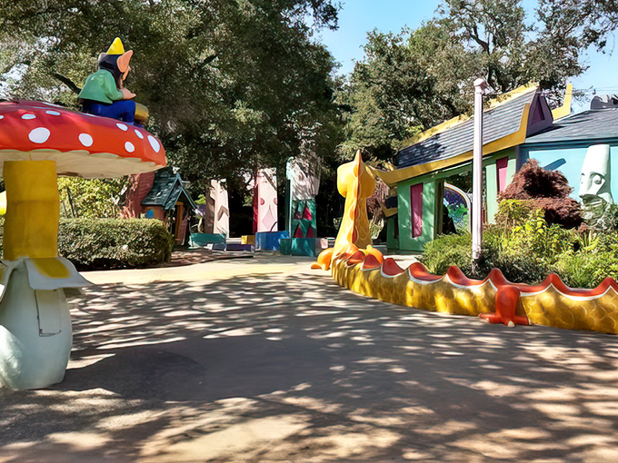 Mushroom houses and fantastical structures line pathways where reality takes a backseat to imagination.