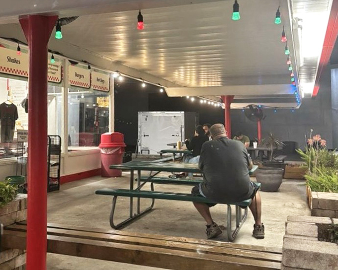 As evening falls, the patio transforms into a community gathering spot. String lights overhead turn simple meals into occasions worth remembering.