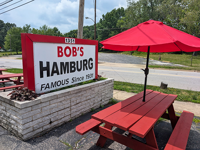 The outdoor dining area says "we're casual" with its fire-engine red picnic tables and umbrellas &ndash; summer perfection in Akron.