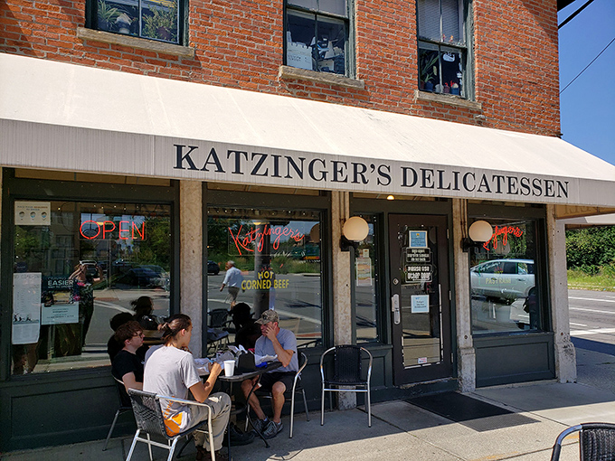The sidewalk seating isn't just outdoor dining—it's theater, where you become the envy of passersby as you publicly display your excellent sandwich choices.