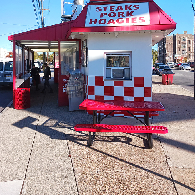 The red picnic table&mdash;where strangers become friends united by the universal language of "this sandwich is changing my life right now."