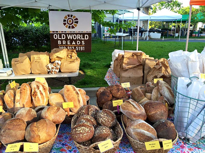 Farmers market magic. Old World Breads' pop-up stand proves that fresh bread in the great outdoors somehow tastes even better than indoors&mdash;science can't explain it.