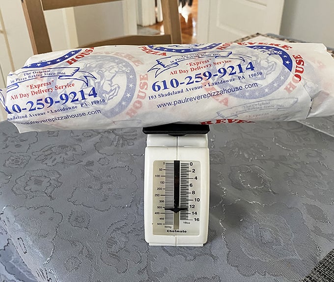 The wrapped sandwich, ready for its journey home. Some treasures are best enjoyed in your own dining room.