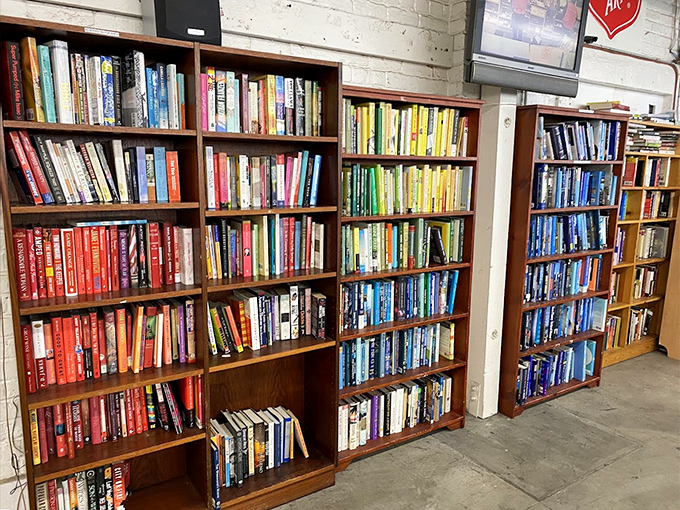 Color-coded bookshelves create a rainbow of reading possibilities&mdash;from beach reads to classics&mdash;all organized for maximum browsing pleasure.