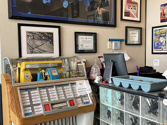 The vintage register and glass block counter&mdash;where nostalgia meets function. This corner of Oscar's tells you they respect tradition almost as much as perfectly cooked eggs.