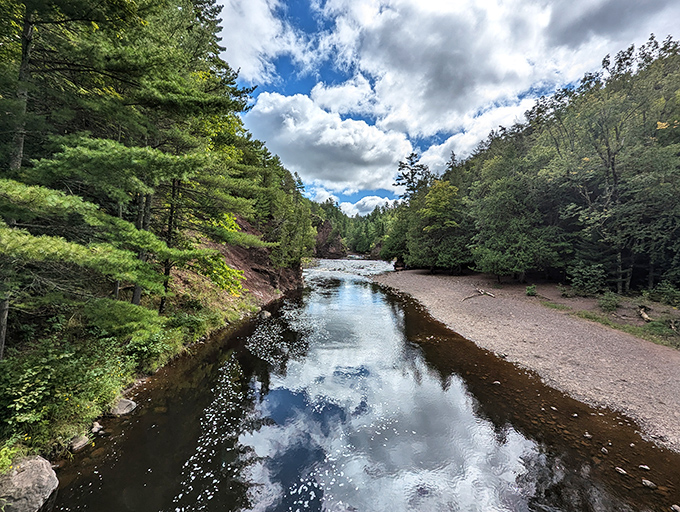 The Bad River reflects clouds so perfectly you'll question which way is up. Nature's own infinity pool without the resort prices.