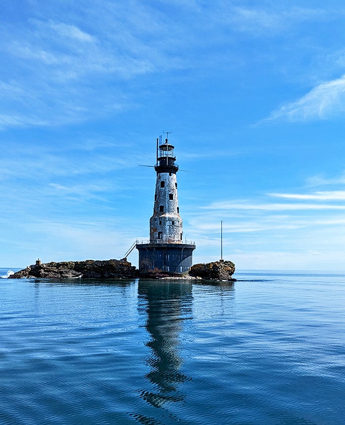 Rock of Ages Lighthouse stands like a sentinel from another era, when navigation required more than asking Siri for directions.
