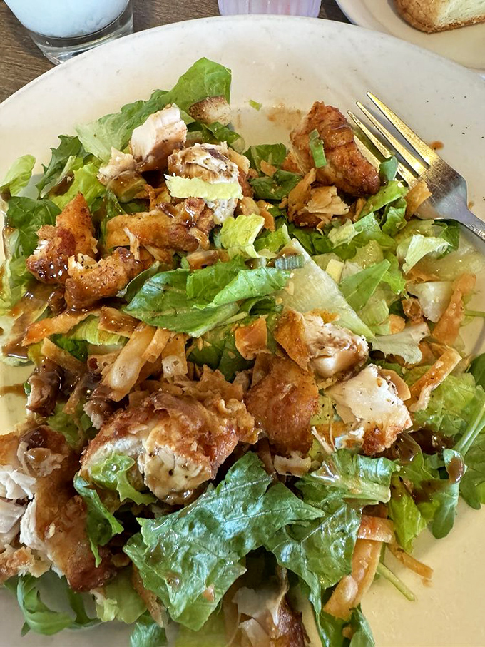 This isn't a salad for people on diets&mdash;it's a salad for people who understand that crispy chicken and fresh greens create a textural symphony worth every forkful.