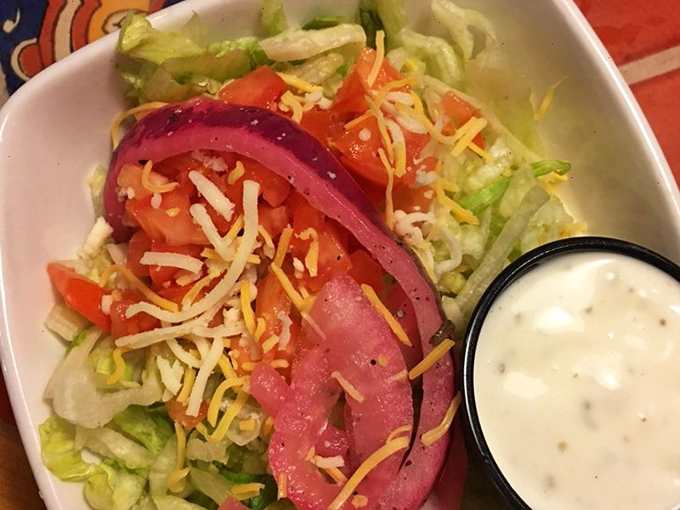 A salad that doesn't apologize for being healthy&mdash;it's too busy showing off those vibrant colors and fresh ingredients. That red onion is wearing its Sunday best. 