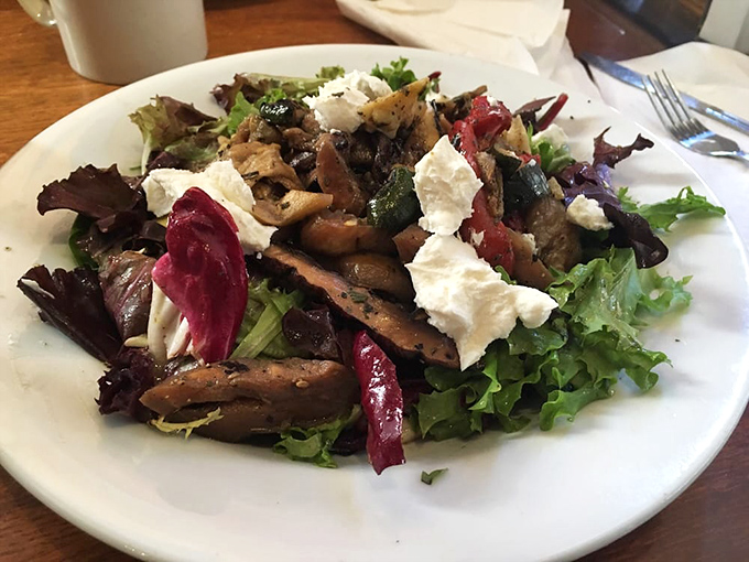 Fresh greens and colorful toppings create a salad that proves healthy eating doesn't have to be boring.