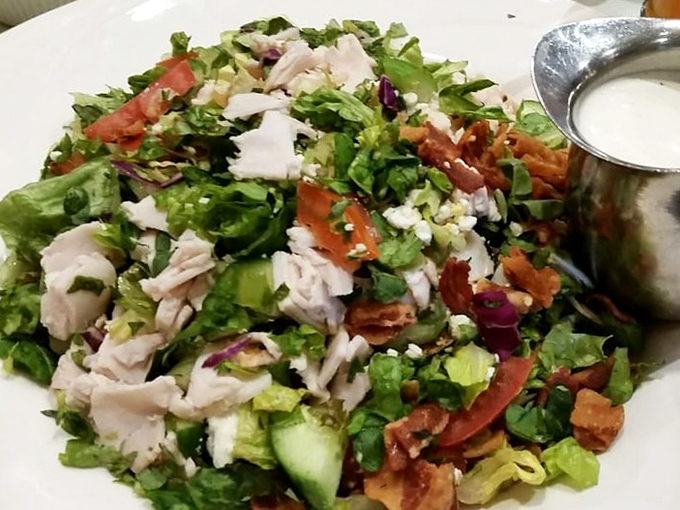 A salad that doesn't apologize for being a salad. Fresh ingredients, proper dressing, and enough substance to satisfy even the most dedicated carnivore.