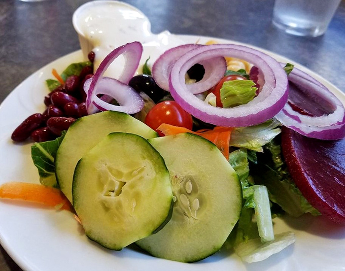 Even the salad deserves respect here&mdash;fresh, colorful, and ready to balance out your seafood extravaganza.