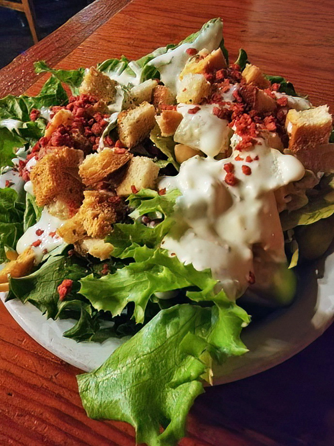 A salad that's made peace with its role as the opening act. Those bacon bits are the backup singers who occasionally steal the show.