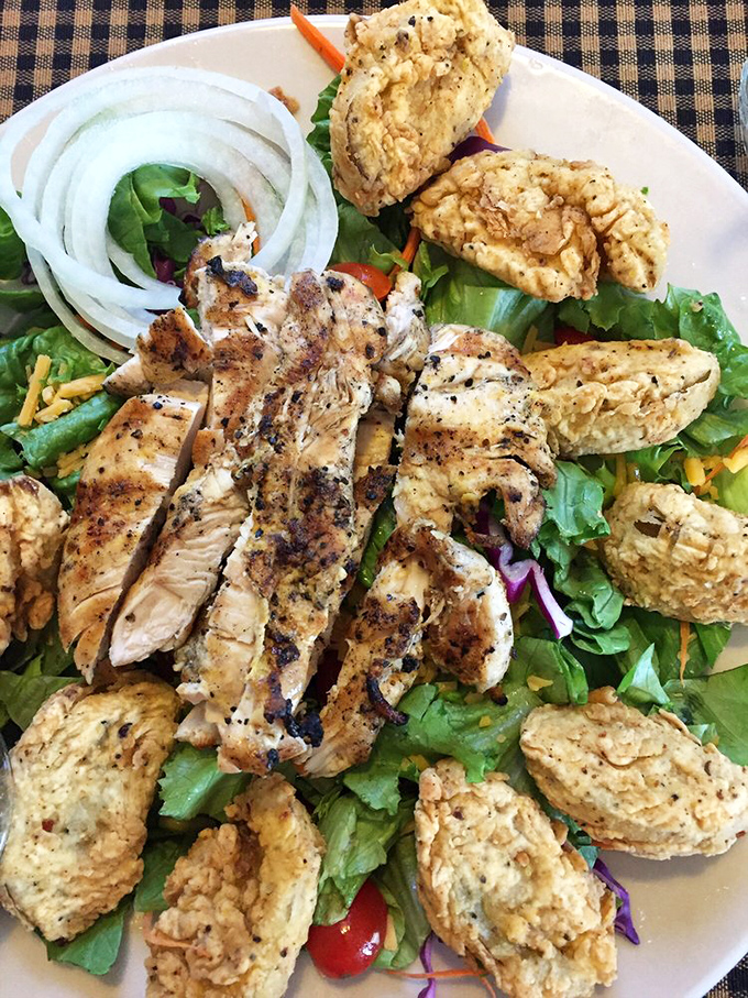 A salad that doesn't apologize for being healthy because those fried green tomatoes and grilled chicken have crashed the nutrition party anyway.