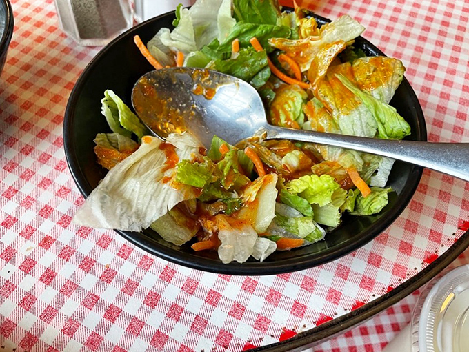 A simple garden salad that does exactly what it should—brings crisp, fresh contrast to all those delicious comfort food indulgences.