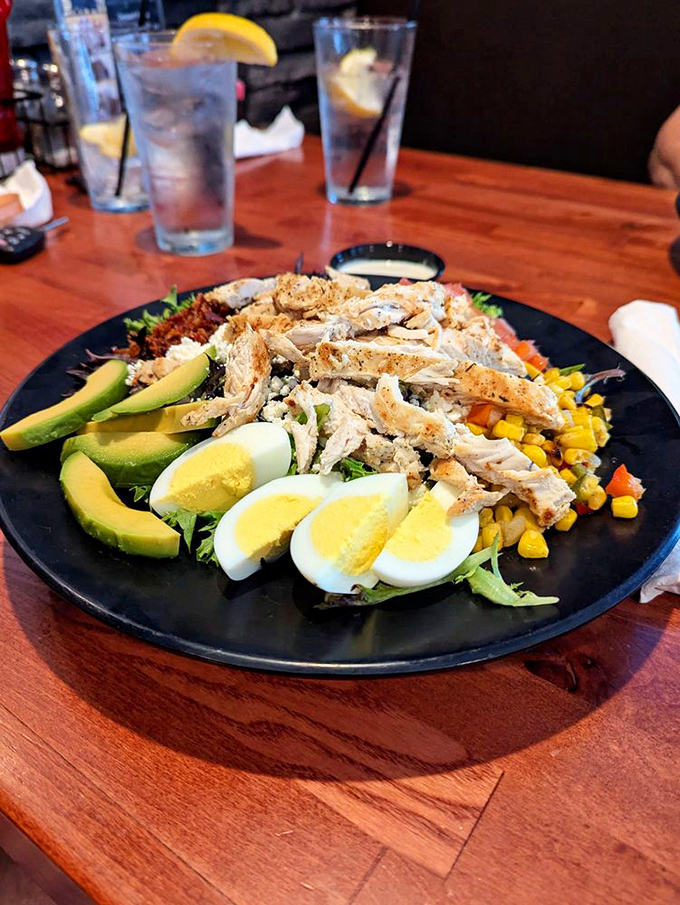 Salad architecture at its finest. When avocado, egg, and grilled chicken come together like this, even dedicated carnivores take notice.