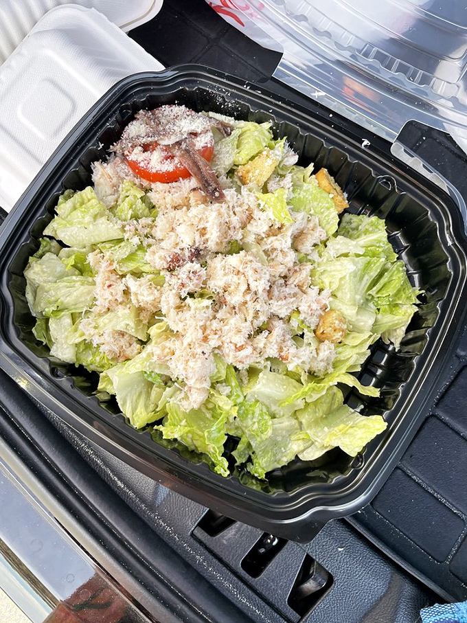 A seafood salad that proves sometimes the ocean's bounty needs nothing more than crisp lettuce and a light touch.