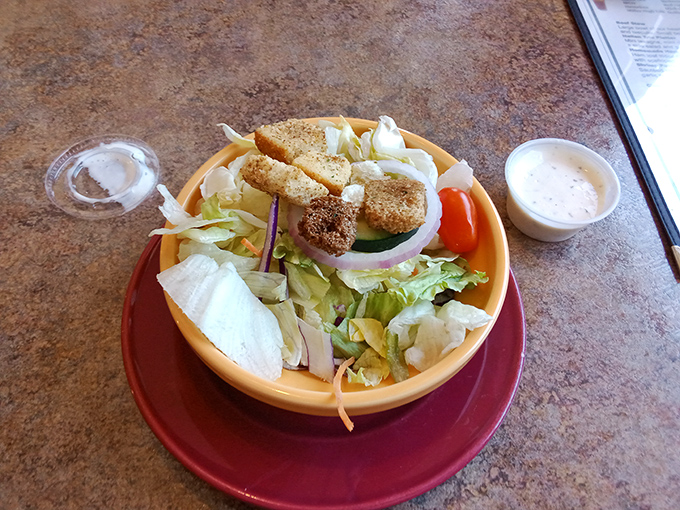 A simple side salad that knows its role&mdash;bringing a touch of virtue to a meal that's otherwise gloriously, unapologetically indulgent.