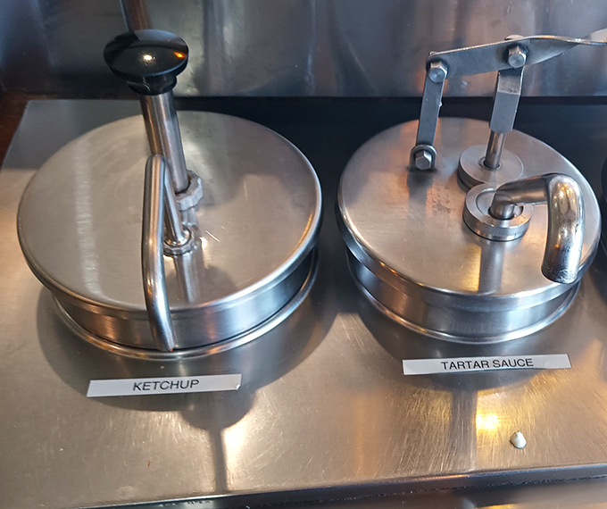 The condiment station—where important decisions are made. Ketchup or tartar sauce? Why not both? It's your seafood journey.