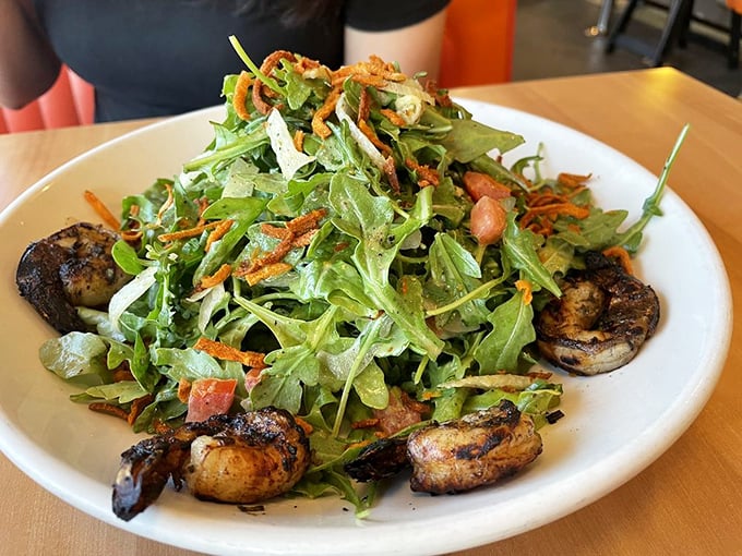 A salad that doesn't apologize for being healthy. Those blackened shrimp and fresh greens create the perfect California compromise.