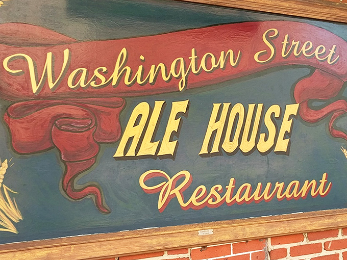 The hand-painted sign that's welcomed hungry patrons for decades. Some restaurants have logos; Washington Street Ale House has a genuine signature.