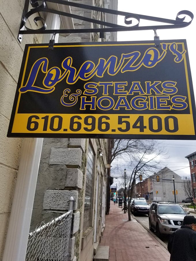 The sidewalk sign beckons like an old friend, promising sandwich salvation to weary West Chester pedestrians.