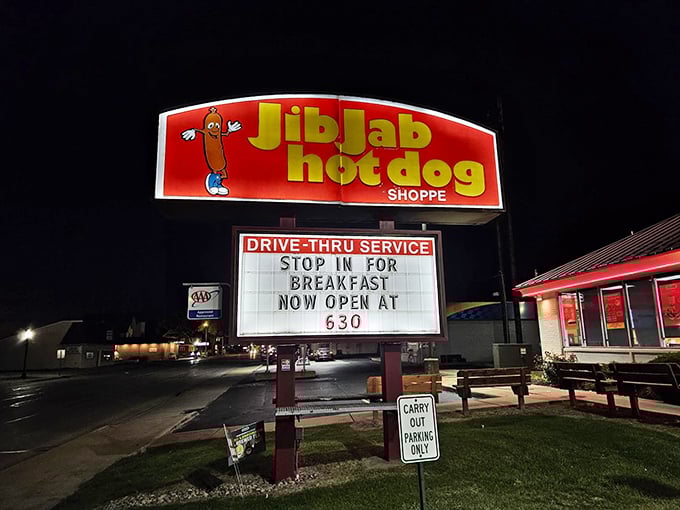 That sign's been promising breakfast since 6, like a beacon of hope for early risers and night owls alike.