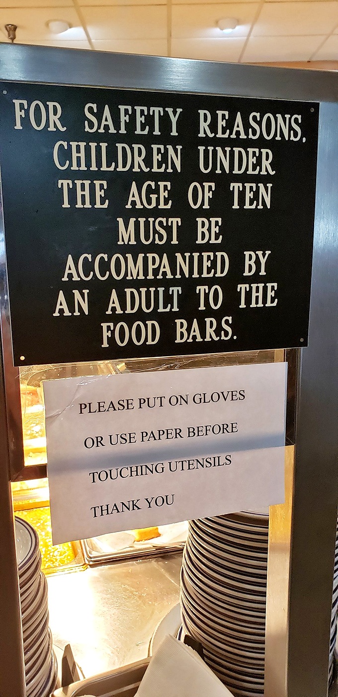 The safety sign that essentially translates to: "Children under ten shouldn't be trusted around food any more than adults can be trusted around an unattended dessert bar."