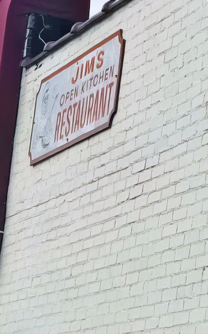 A simple sign that promises big flavors and delivers on every single delicious word.