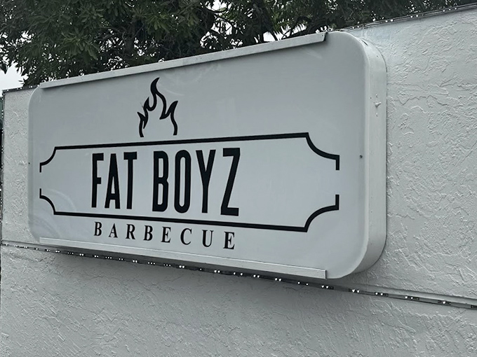 The sign doesn't need to shout&mdash;it knows the reputation that follows those two simple words: "Fat Boyz Barbecue."