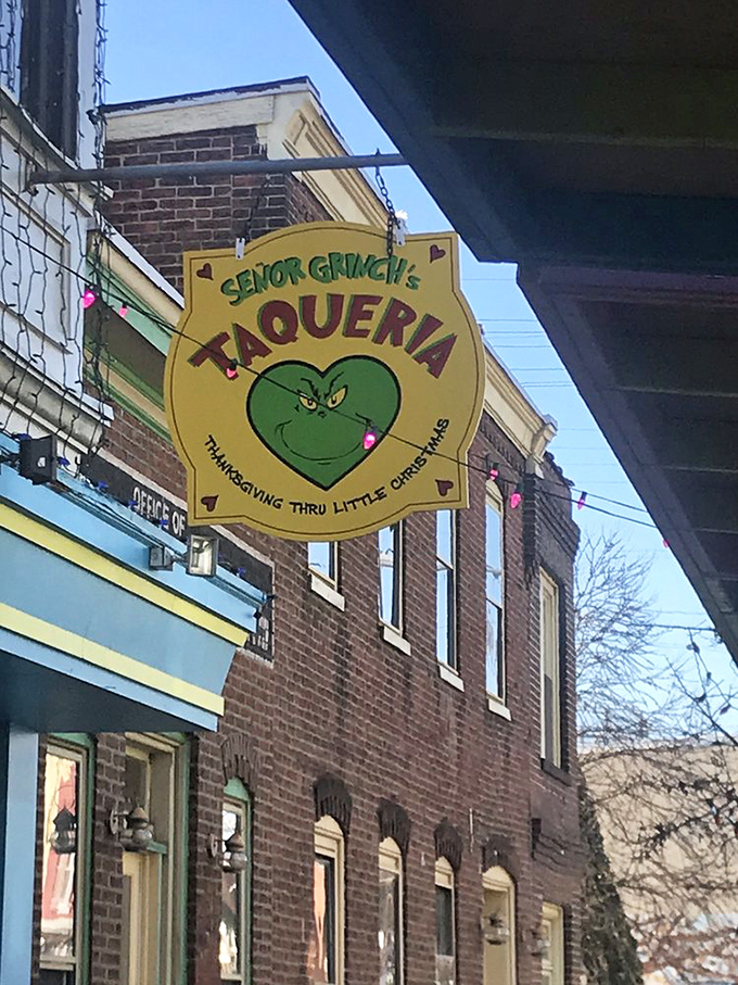 Even the Grinch would crack a smile at this playful signage announcing "Thanksgiving Thru Little Christmas."