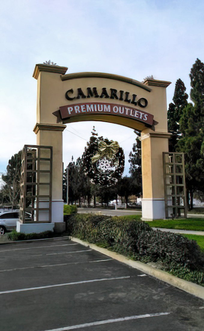 The grand entrance arch announces you've arrived at bargain paradise. Your credit card may be trembling, but your closet is rejoicing.