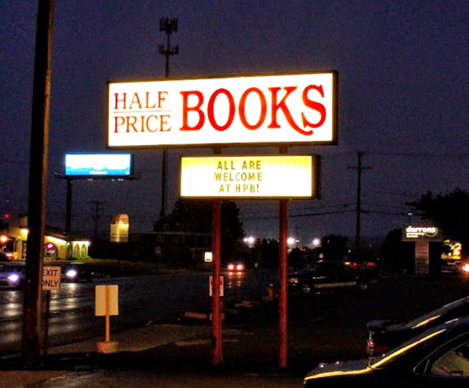 Even at night, the Half Price Books sign glows with promise: "All Are Welcome"&mdash;the bibliophile's version of "Open 24 Hours."