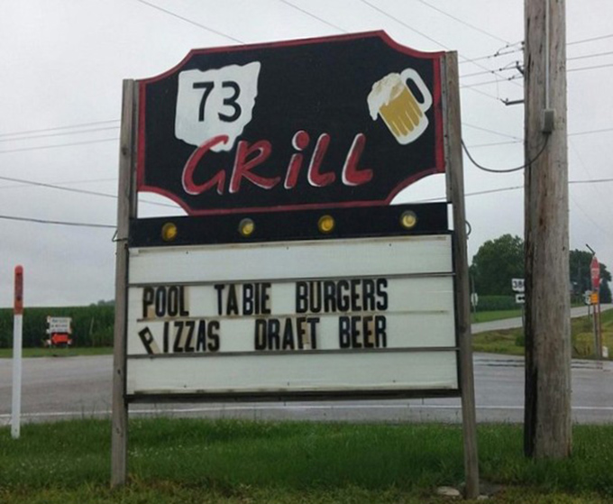 The roadside beacon that's guided hungry travelers for years. Like a lighthouse for your appetite, this sign promises safe harbor for empty stomachs.