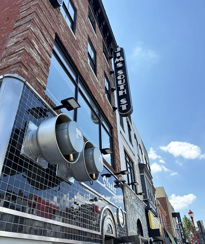 The vertical Jim's South St. sign stands as a landmark on the Philadelphia streetscape, guiding hungry souls to cheesesteak salvation.