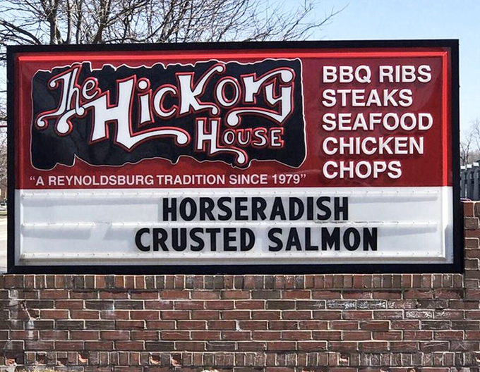 This sign isn't just announcing specials&mdash;it's broadcasting promises. "Horseradish Crusted Salmon" isn't just a dish; it's tonight's headliner in a delicious concert.