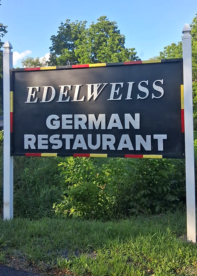 The sign promises German food with no ambiguity&mdash;like a culinary border crossing where your passport is stamped with gravy.