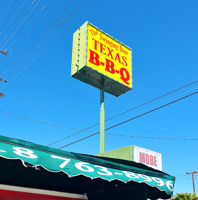 That yellow and red sign against the blue California sky&mdash;a Texas BBQ promise standing tall in North Hollywood.