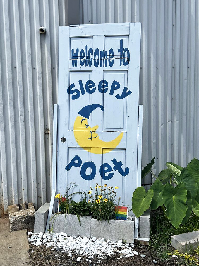 The whimsical welcome door captures the playful spirit that makes Sleepy Poet more than just another antique mall.