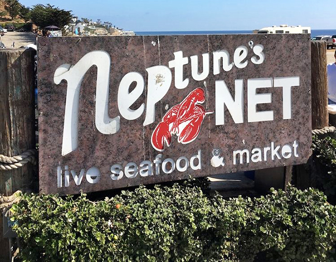 The sign that's launched a thousand road trips – Neptune's Net has been calling seafood lovers to Malibu for generations.