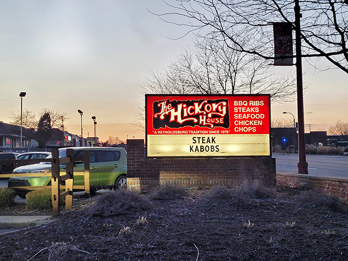 The iconic Hickory House sign beckons hungry travelers to discover Reynoldsburg's best-kept culinary secret.