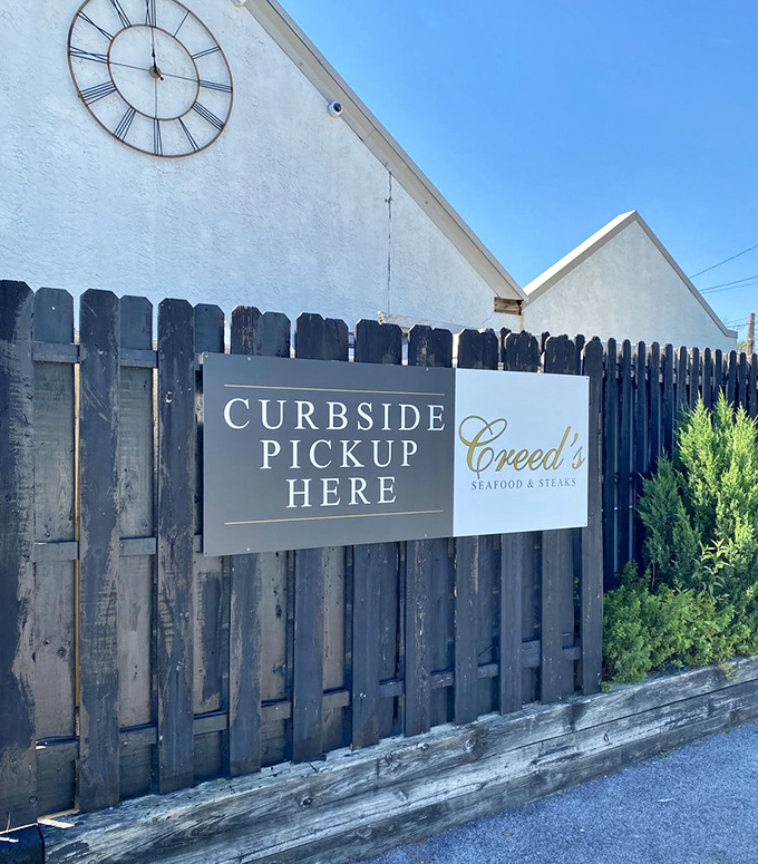 Even their curbside pickup sign has dignity&mdash;because great food deserves respect whether you're dining in or taking home.