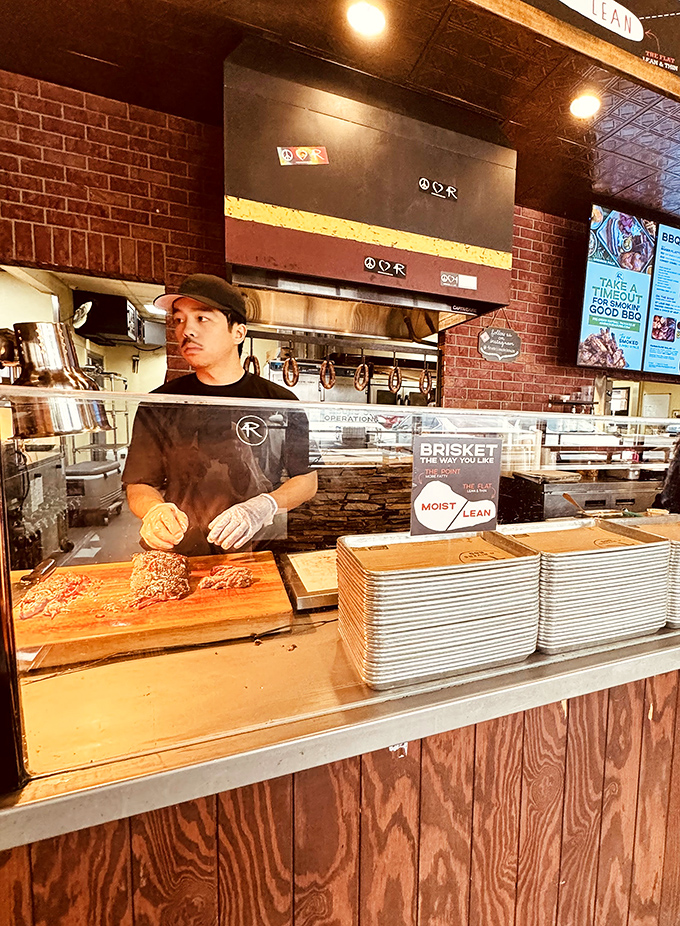Behind every great BBQ joint is a pitmaster with skilled hands and the patience of a saint. The art of brisket-slicing is not for amateurs.